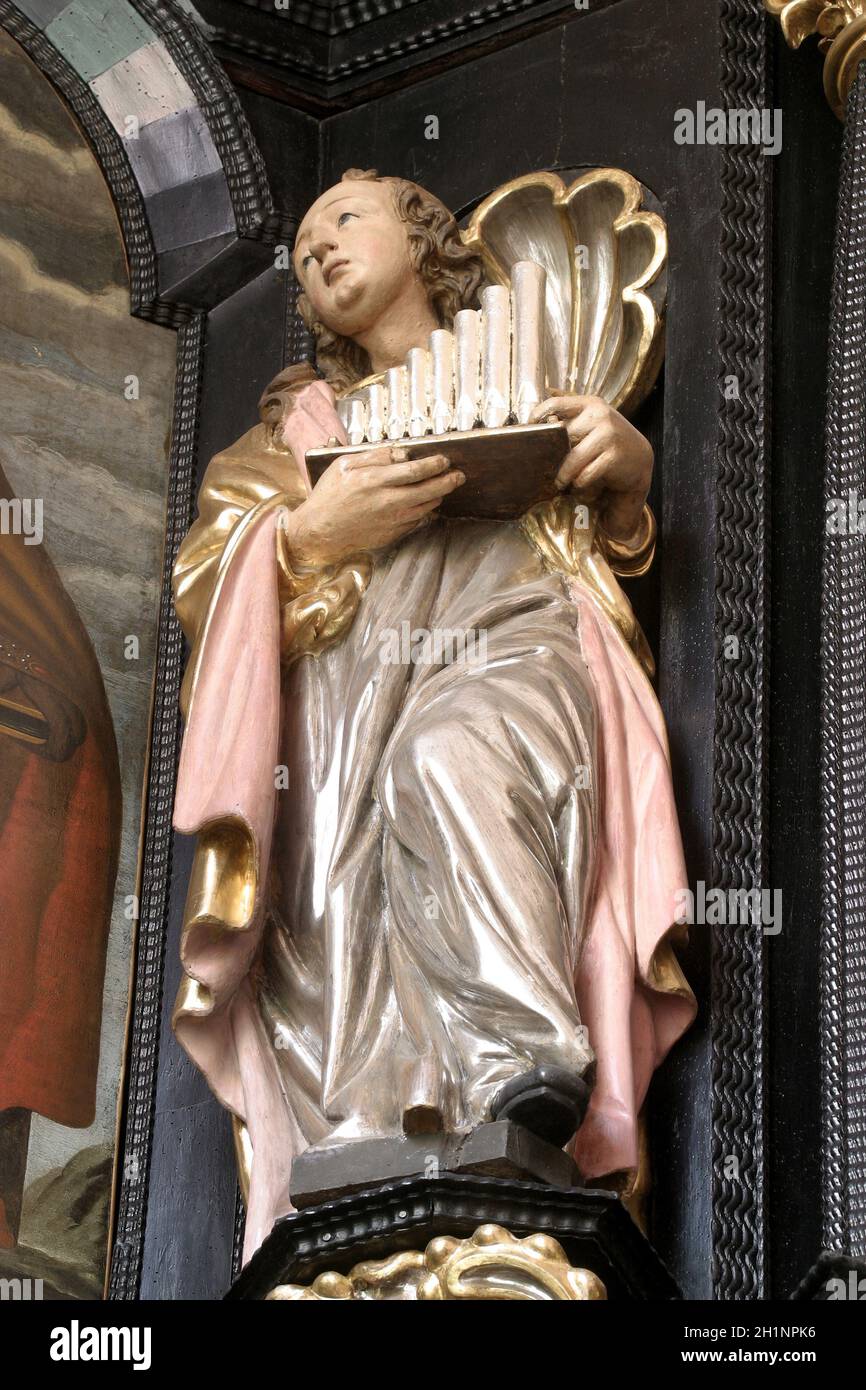 Die heilige Cecilia, Statue auf dem Altarbild der heiligen Apollonia in der Kirche der heiligen ...