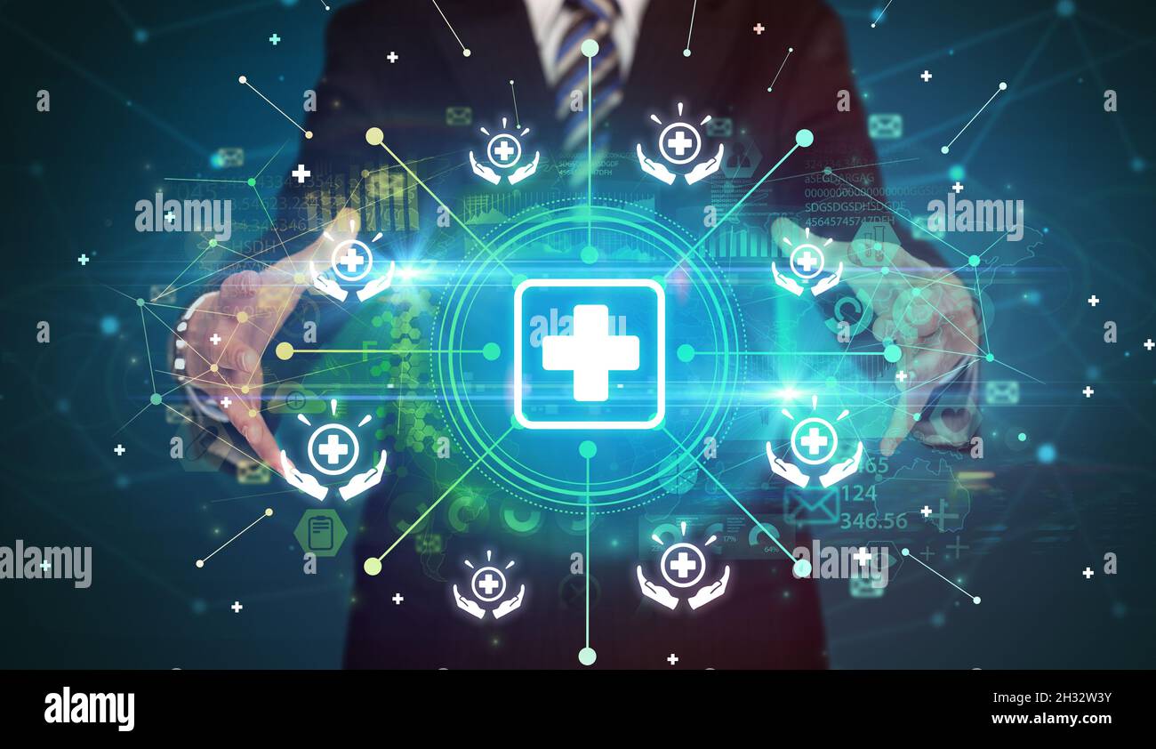 Das Konzept der Symbole für das Gesundheitswesen mit der Hand ...