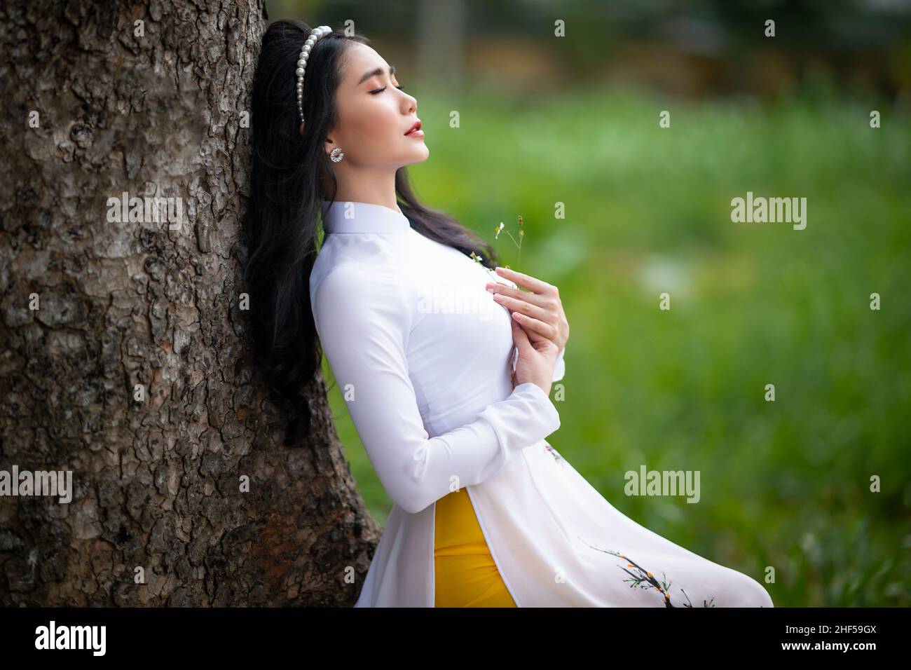 Ho Chi Minh City, Vietnam: Portrait Frauen in weiß AO dai Vietnam, die ...