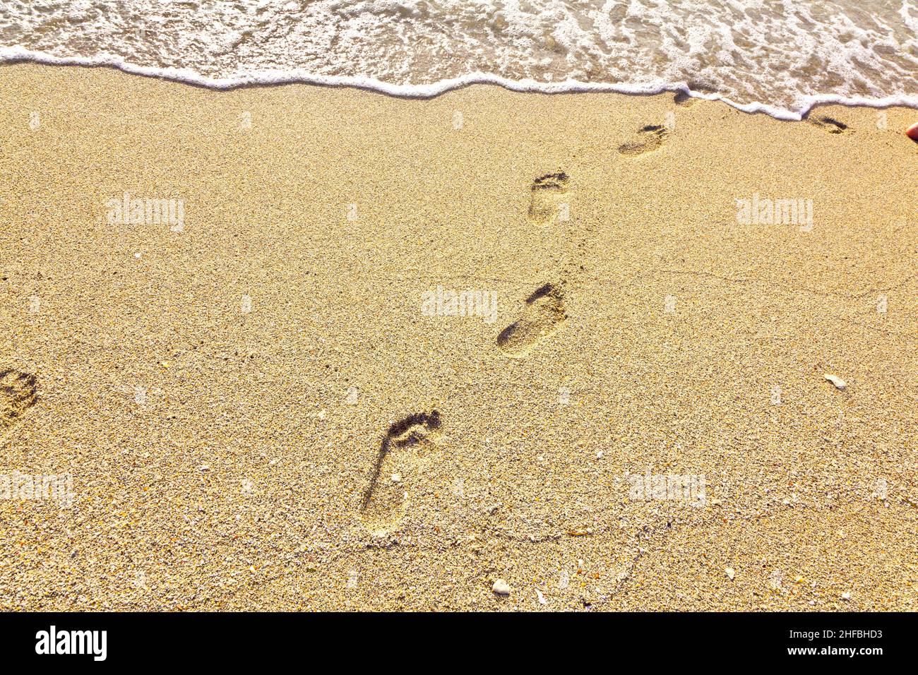 Schritte am Strand im Sand Stockfotografie - Alamy