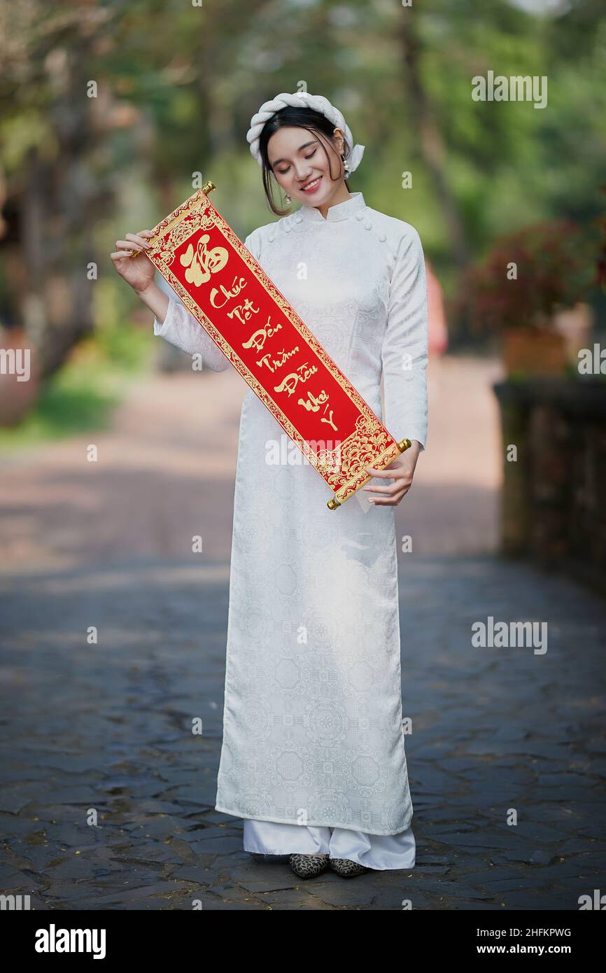 Ho Chi Minh City, Vietnam: Portrait Frauen in weiß AO dai Vietnam, die ...