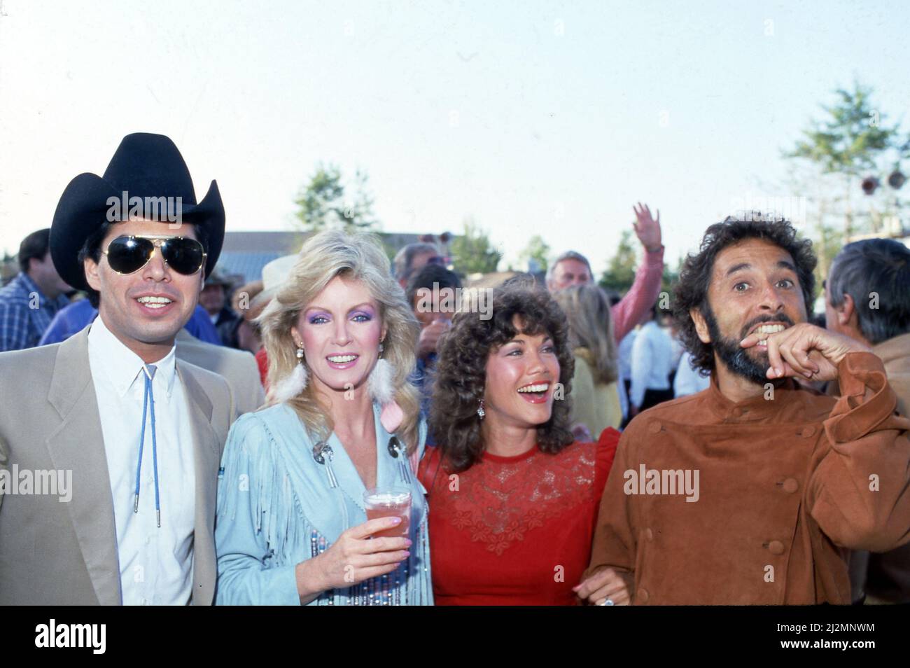 Robert Holland, Donna Mills, Barbi Benton und George Gradow um die ...
