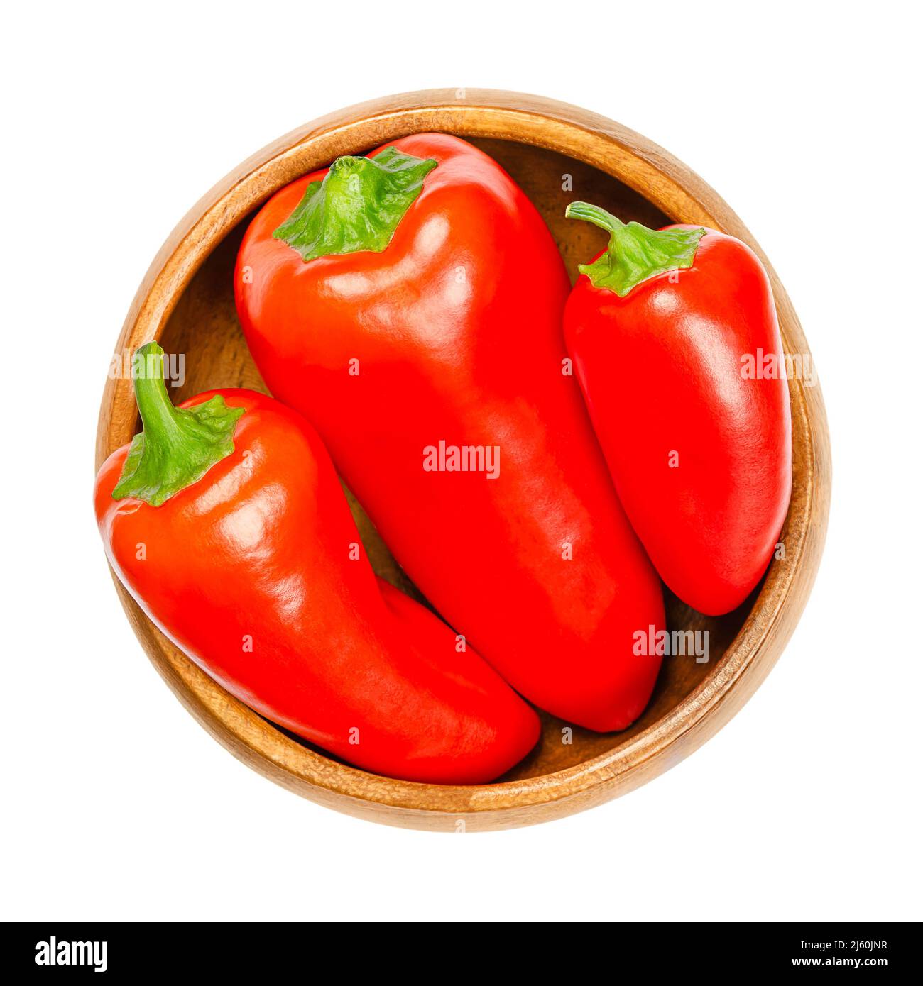 Naschen Sie rote Mini-Paprika, in einer Holzschüssel. Reife und frische ...
