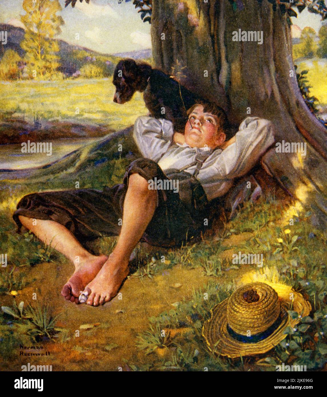 1920S BARFUSS JUNGE UND SEIN HUND LIEGEN UNTER BAUM TAGTRÄUMEN ...