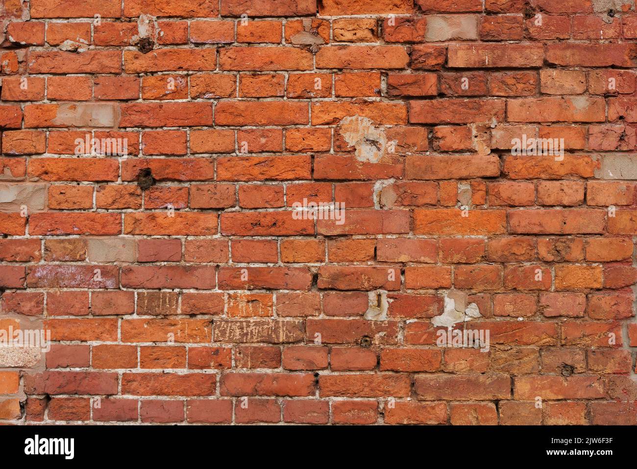 Alte Backsteinmauer. Mauerwerk aus einem alten Backstein im rustikalen ...
