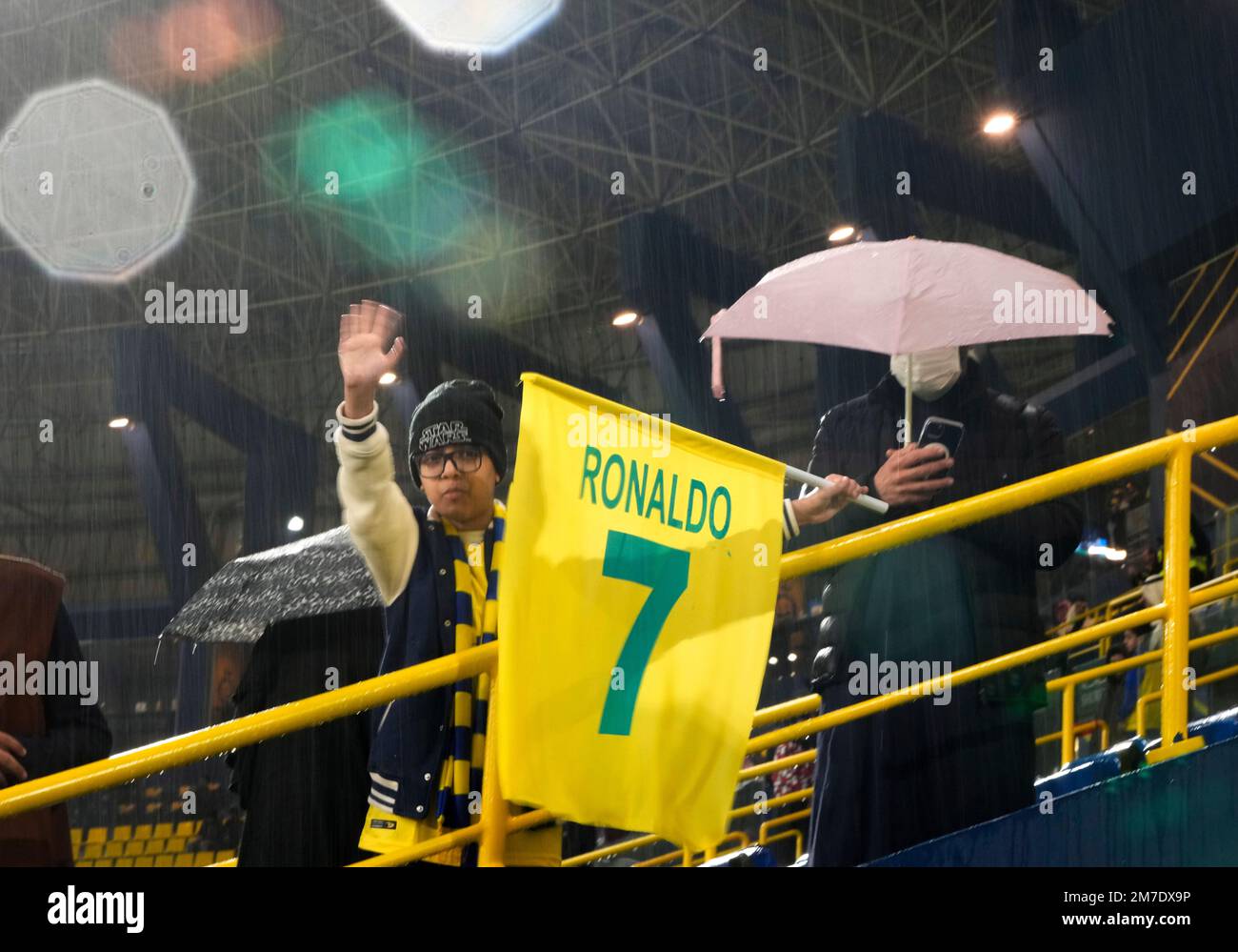 Al Nassr fans holds a T-shirt with Cristiano Ronaldo, a new member of ...
