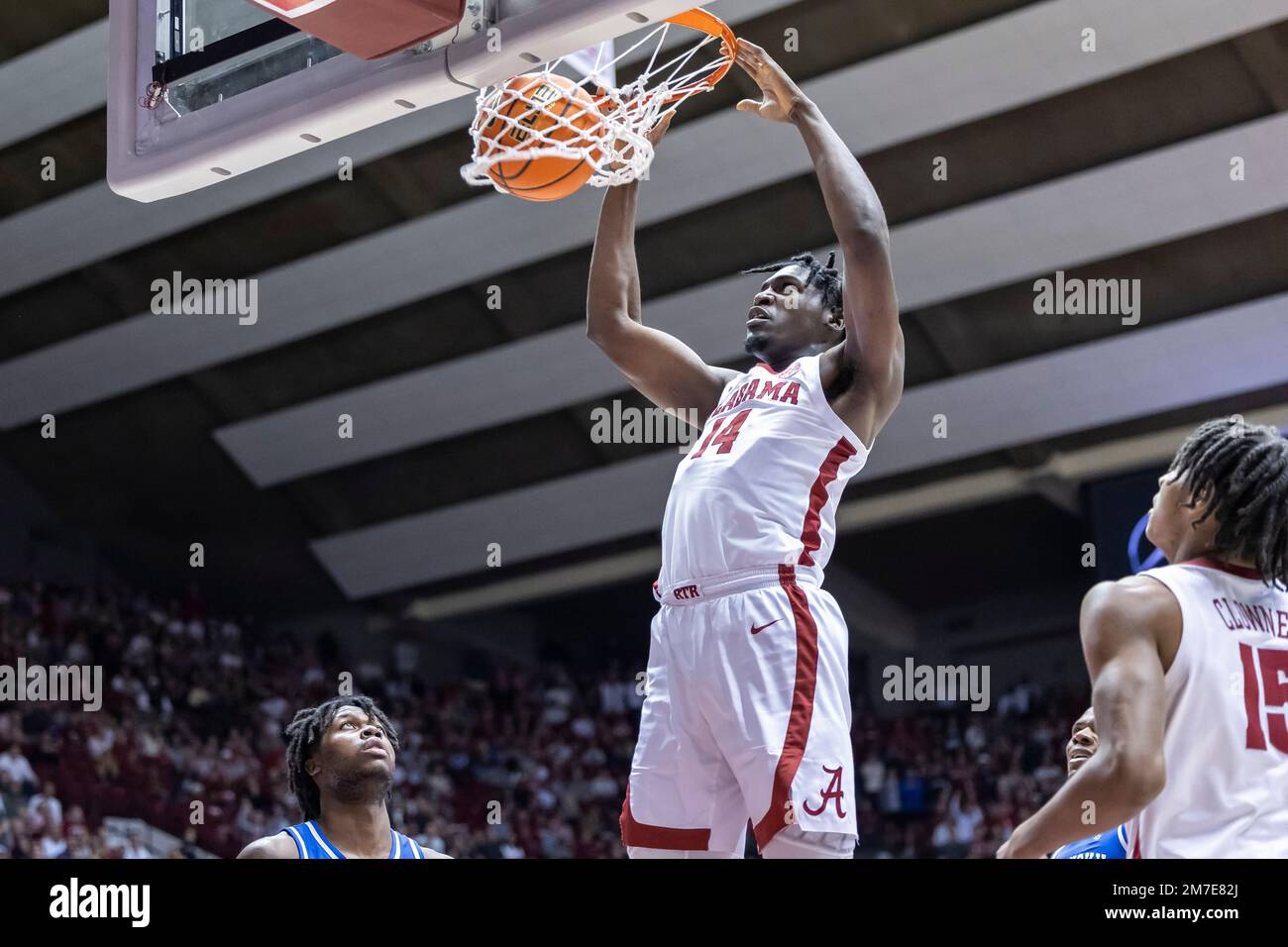 Alabama center Charles Bediako (14) dunks the ball during the first ...