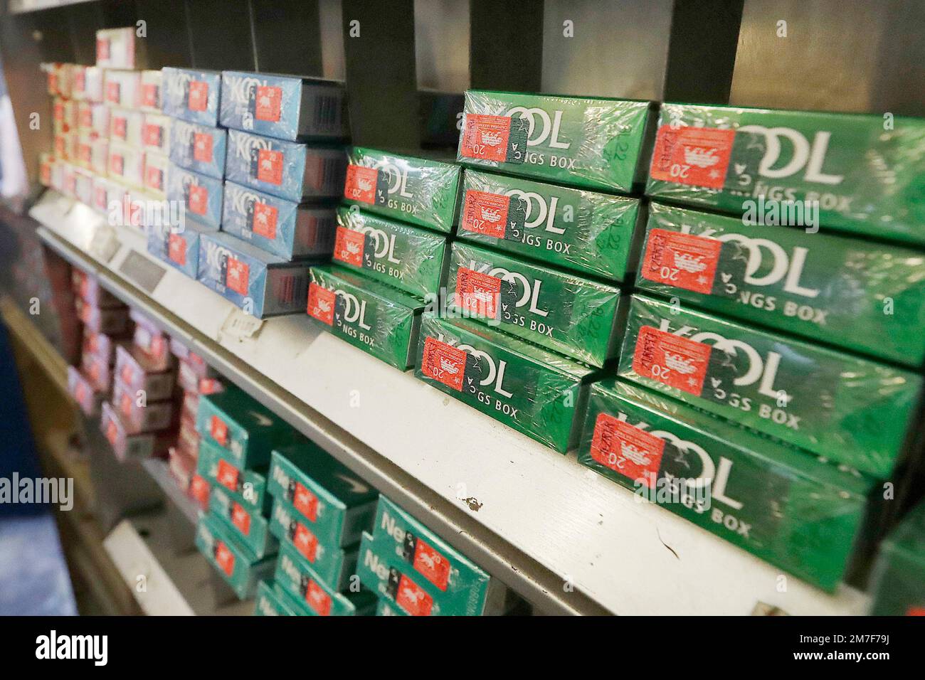 FILE - Menthol cigarettes and other tobacco products are displayed at a ...