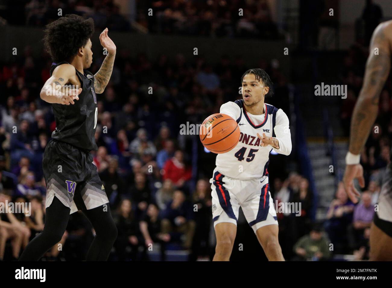 Gonzaga guard Rasir Bolton, right, passes the ball while defended by ...