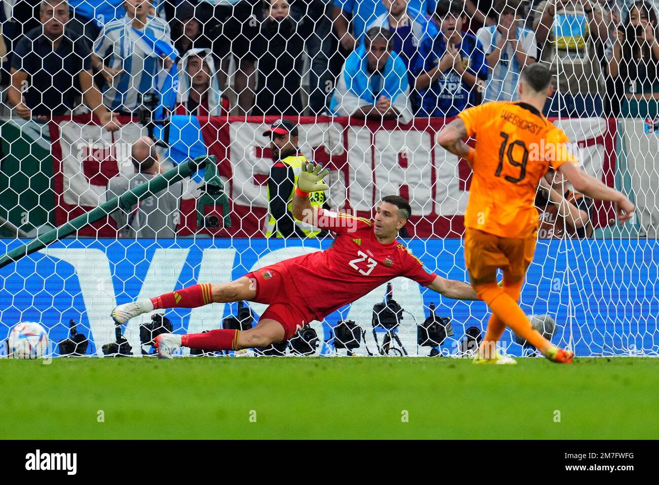 Argentina's goalkeeper Emiliano Martinez fails to save a kick by Wout ...