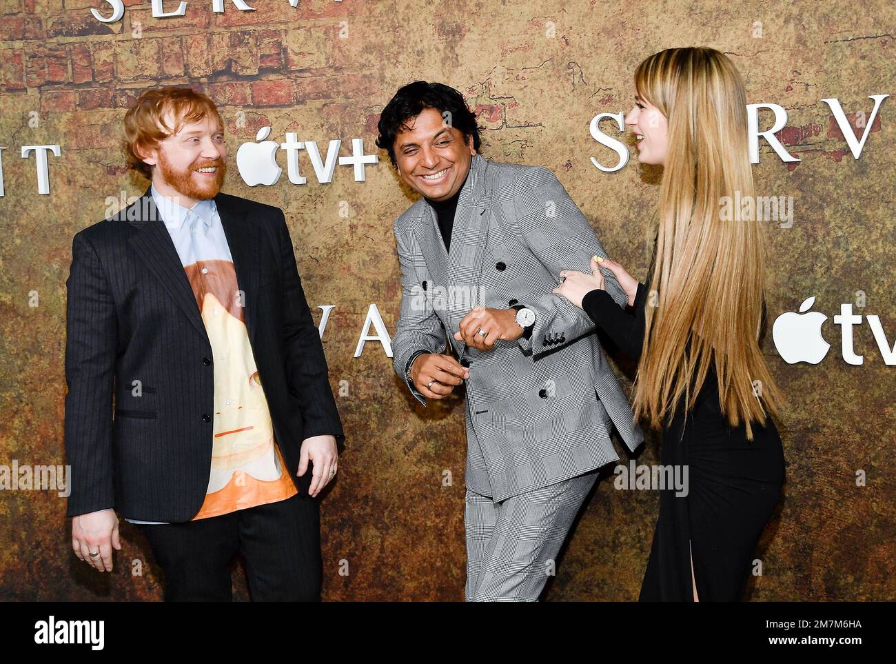 Rupert Grint, left, M. Night Shyamalan and Nell Tiger Free attend the ...