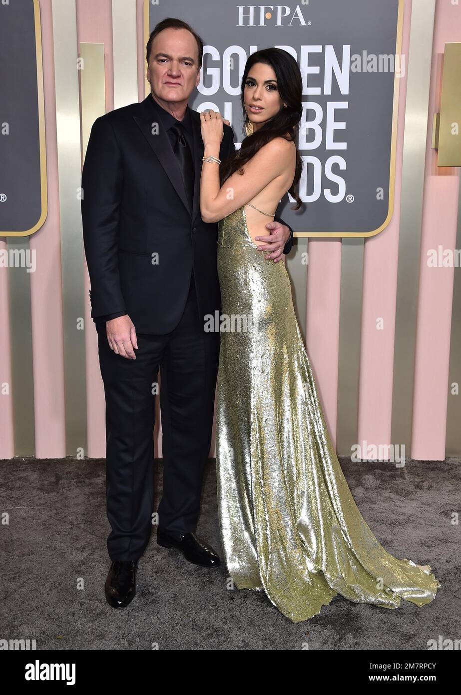 Quentin Tarantino, left, and Daniella Pick arrive at the 80th annual Golden Globe Awards at the ...