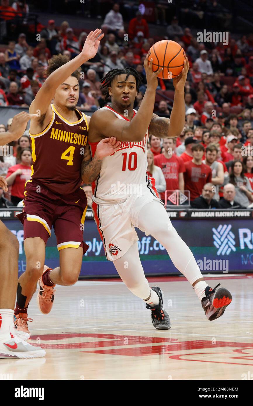 Ohio State's Brice Sensabaugh, right, drives against Minnesota's ...