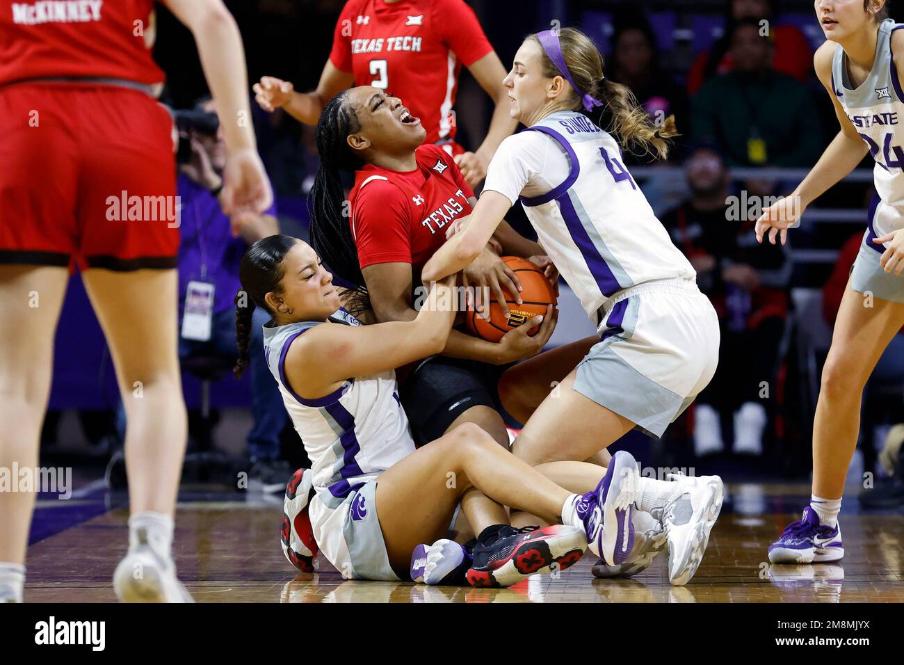 Kansas State's Brylee Glenn, left, and Serena Sundell (4) battle for a ...