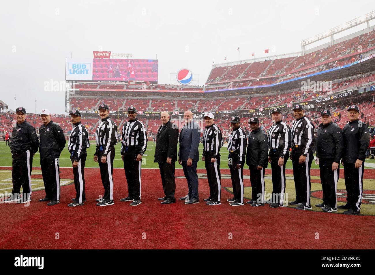 Field judge Dyrol Prioleau (109), umpire Mark Pellis (131), line judge ...