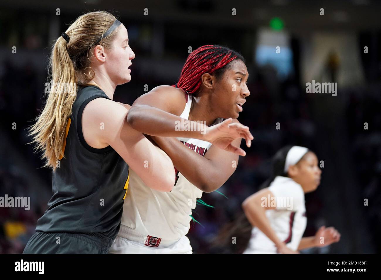 South Carolina forward Aliyah Boston (4) battles for position against ...