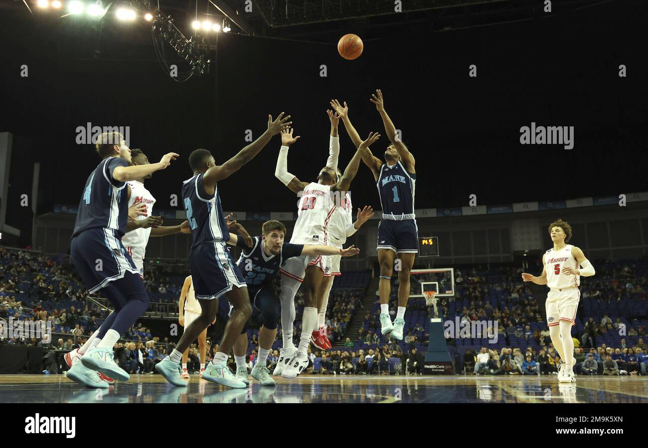 Maine Black Bears' Kellen Tynes (1) and Marist Red Foxes' Javon Cooley ...