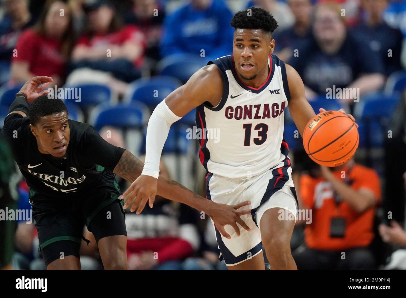 Portland State guard Hunter Woods, left, guards Gonzaga guard Malachi ...