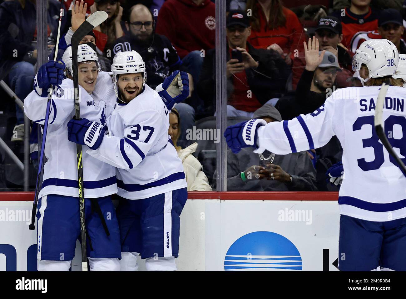 Toronto Maple Leafs right wing Pontus Holmberg, left, is congratulated ...