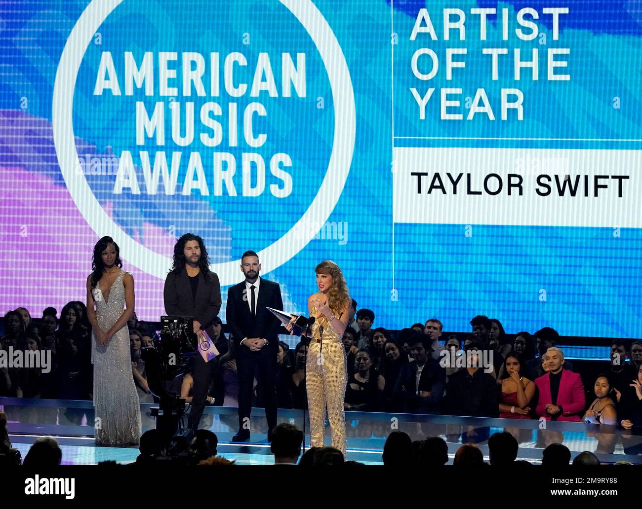 Taylor Swift accepts the award for artist of the year at the American ...