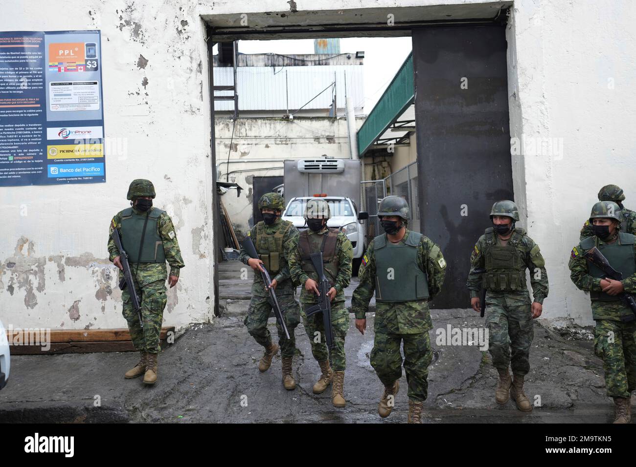Soldiers guard an entrance to the Inca jail as a forensic crime scene ...
