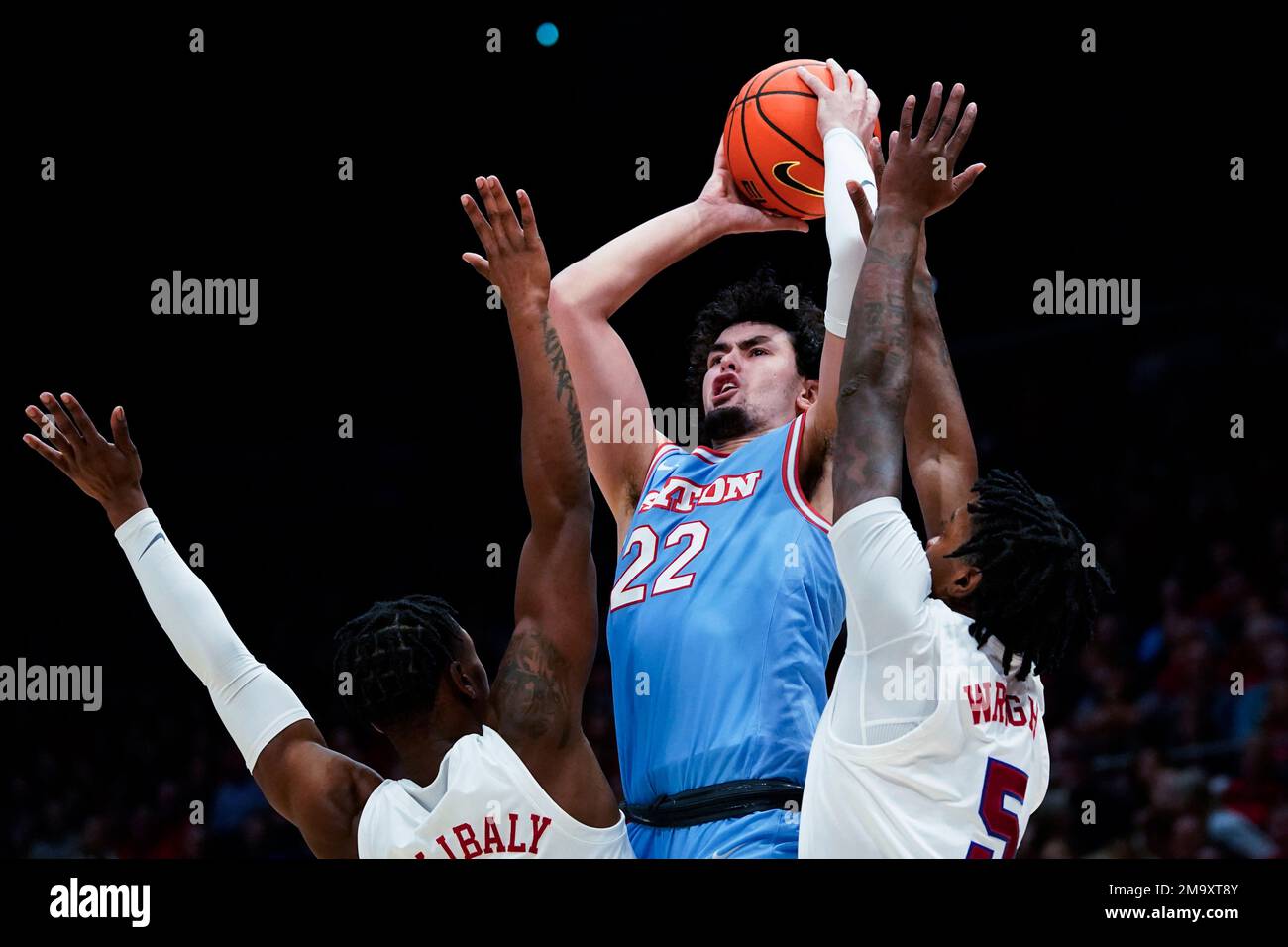 Dayton forward Mustapha Amzil (22) shoots as SMU guard Jefferson ...