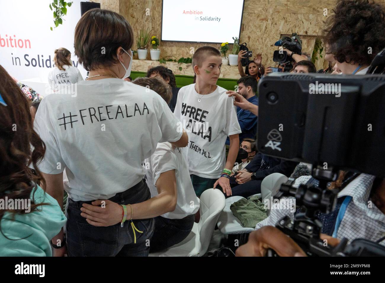 A group of protesters wear T-shirts with #FREEALAA after a panel with ...