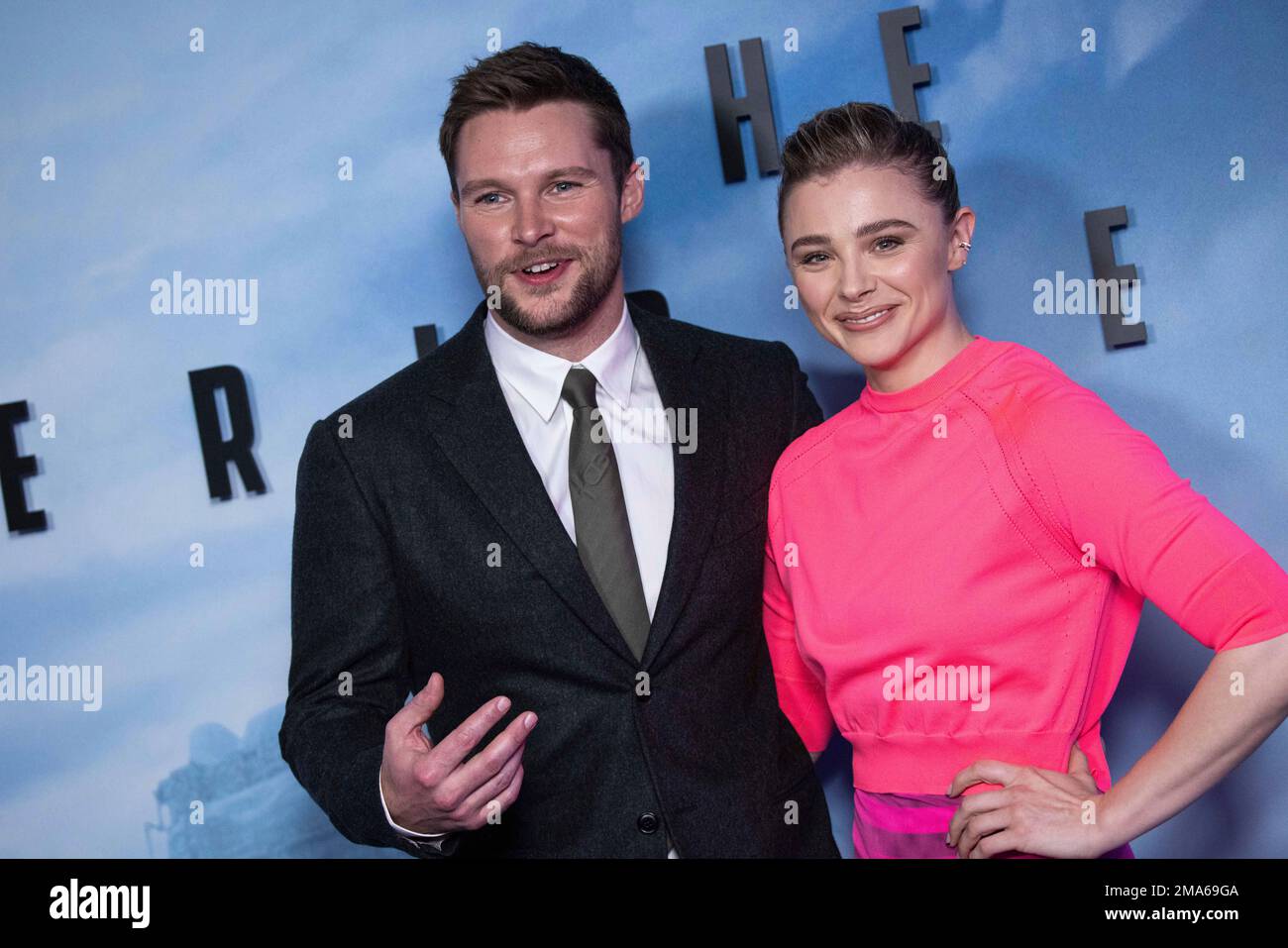 Jack Reynor, left, and Chloe Grace Moretz pose for photographers upon ...