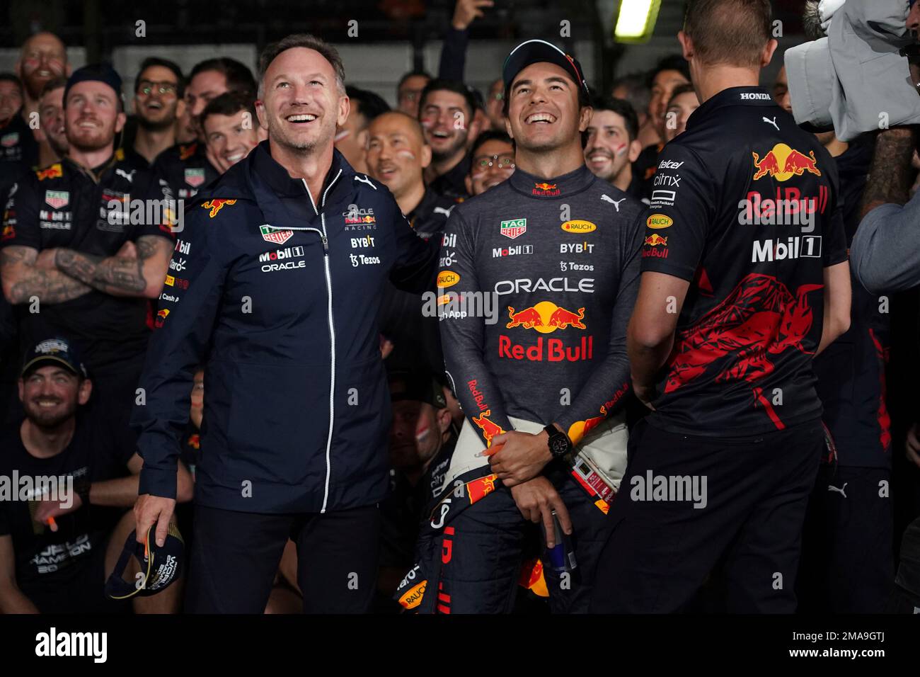 Red Bull driver Sergio Perez, right, of Mexico and Red Bull Team ...