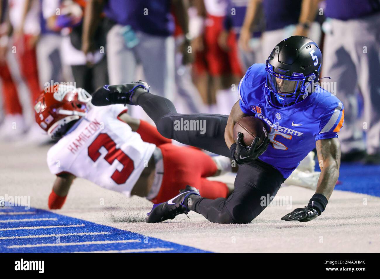 Boise State wide receiver Stefan Cobbs (5) is knocked out of bounds ...