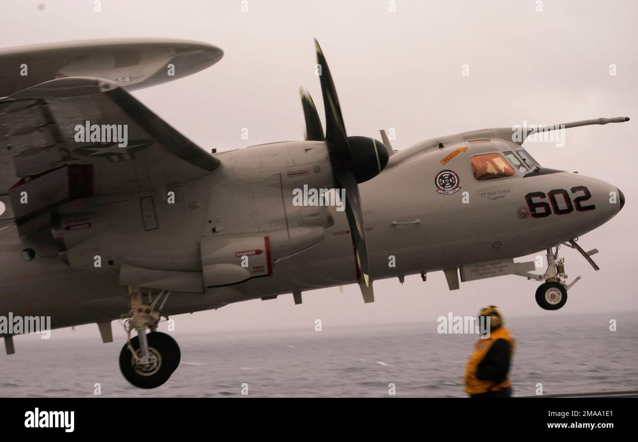 A US Navy E-2 Hawkeye Airborne Command and Control aircraft is launched ...