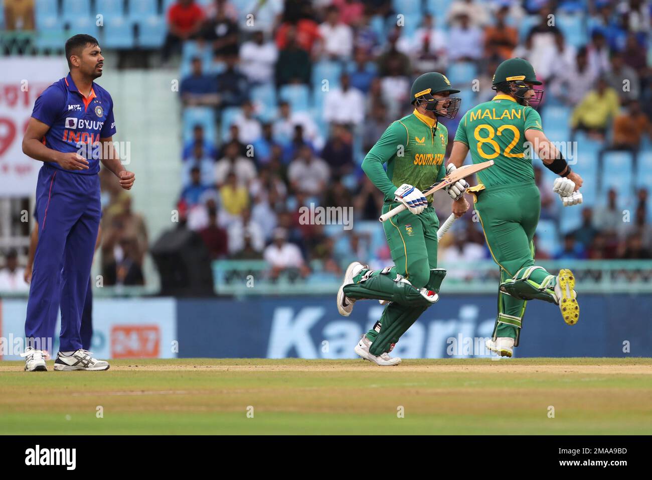 India's Avesh Khan, left, reacts as South Africa's Quinton de Kock ...