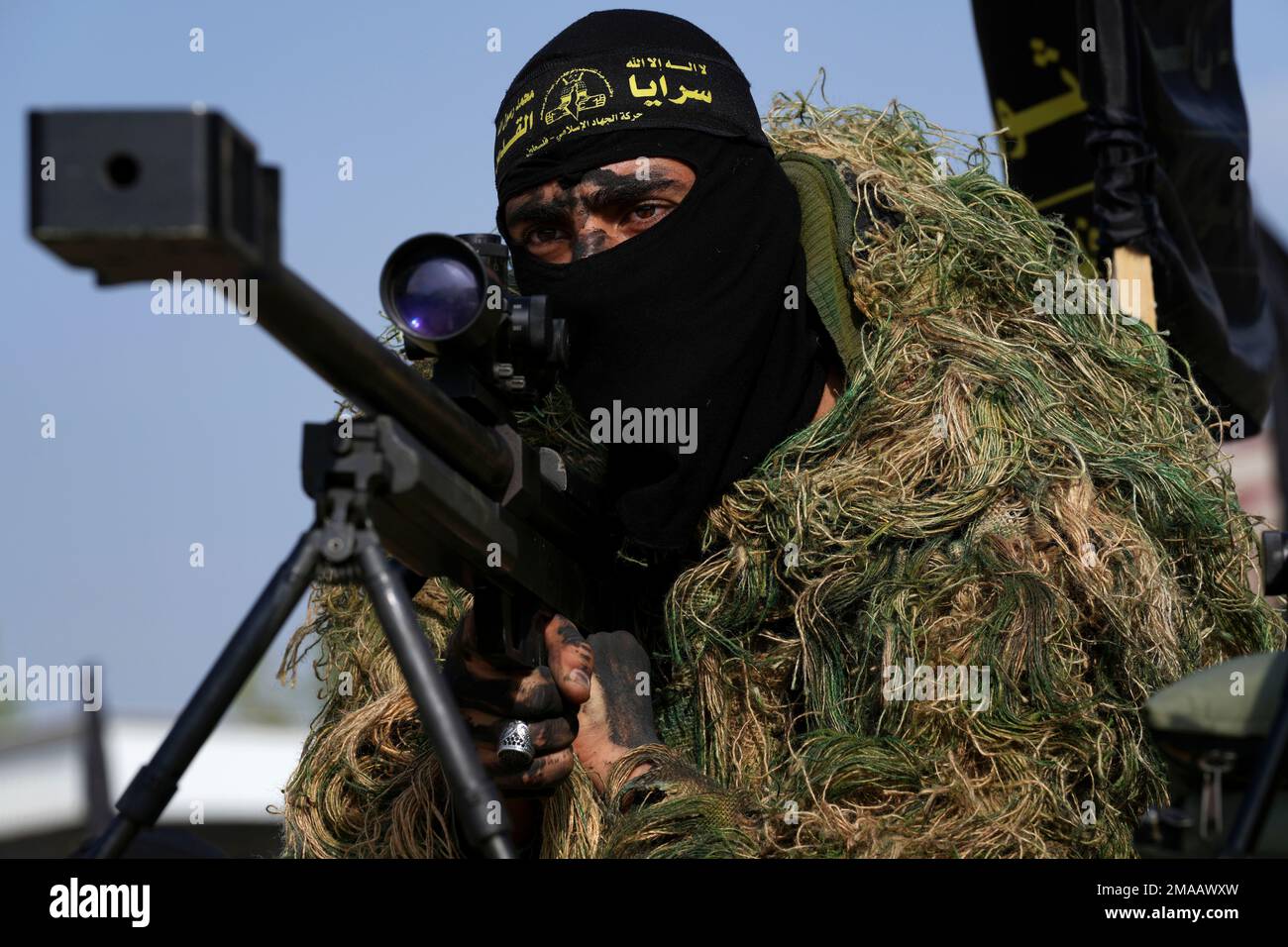 Masked member of the Palestinian Al-Quds Brigades, the military wing of ...