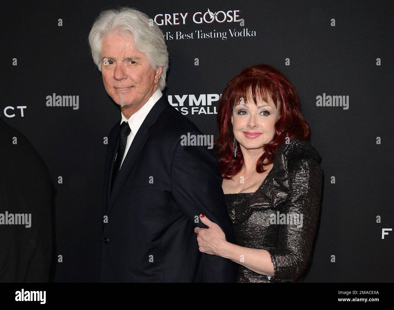 FILE - Naomi Judd, right, and her husband Larry Strickland appear at ...