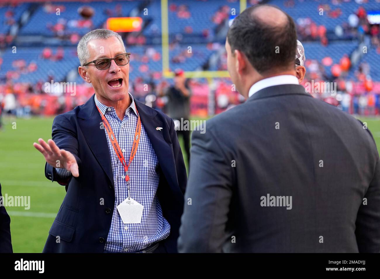 Denver Broncos owner and chief executive officer Greg Penner, left ...