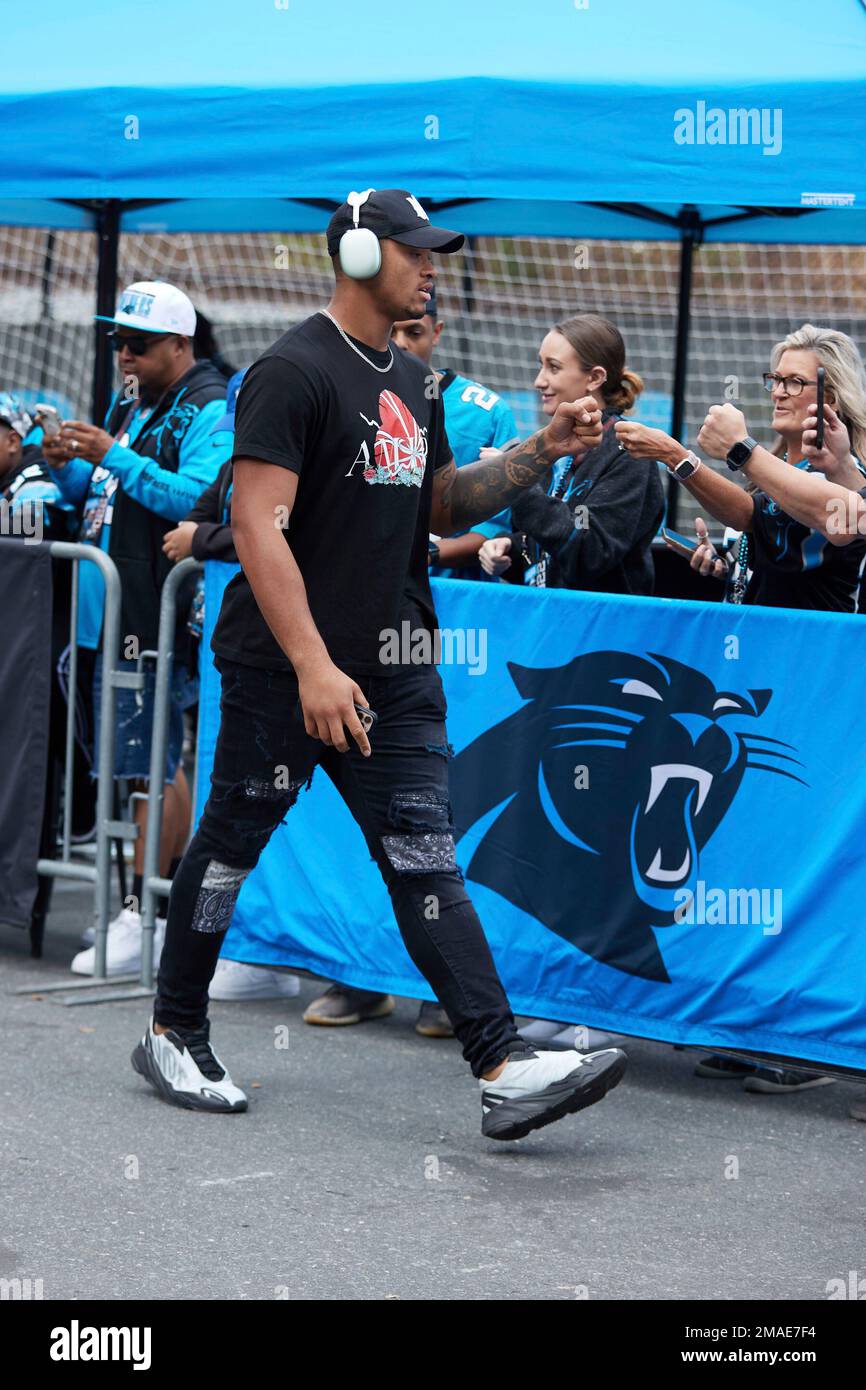 Carolina Panthers defensive end Yetur Gross-Matos (97) fists bumps with ...