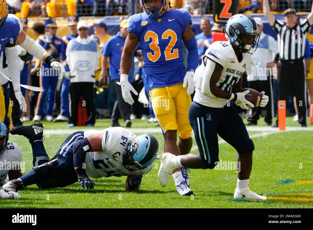 Rhode Island running back Marques DeShields (10) takes a handoff into ...