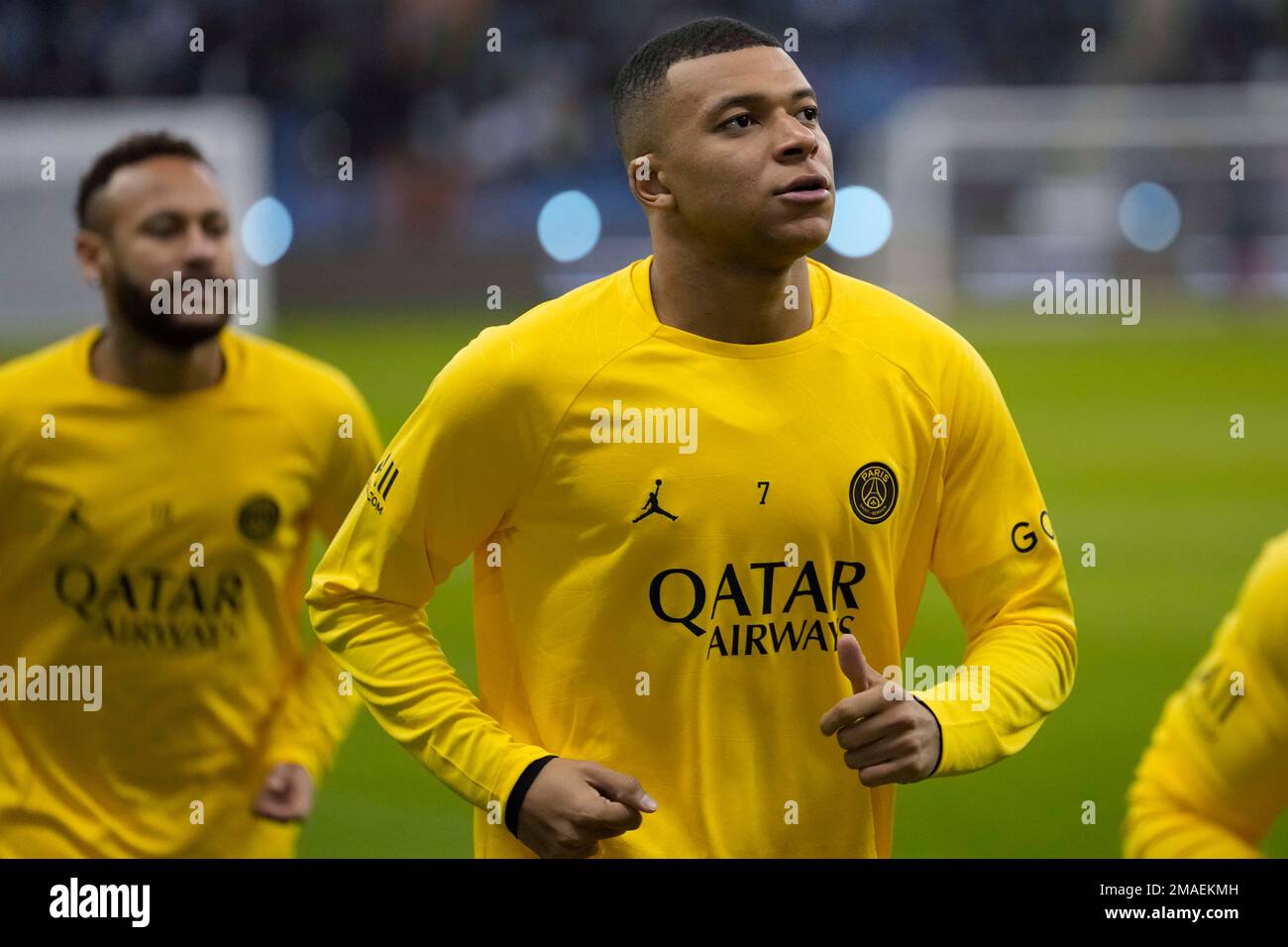 PSG's Kylian Mbappe and his teammate and his teammate warm up prior to ...