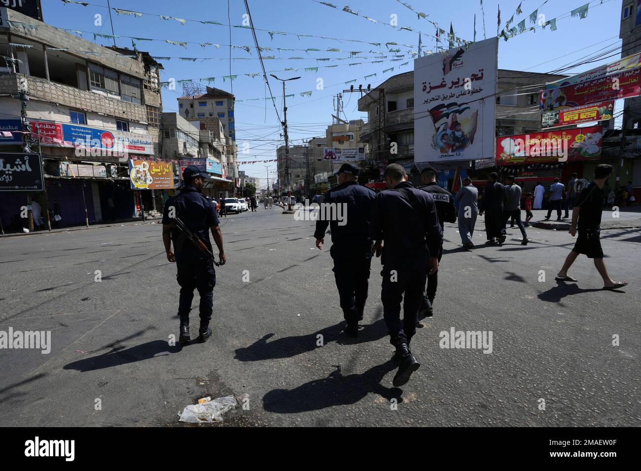 Hamas police officers patrol at the main square during a rally ...