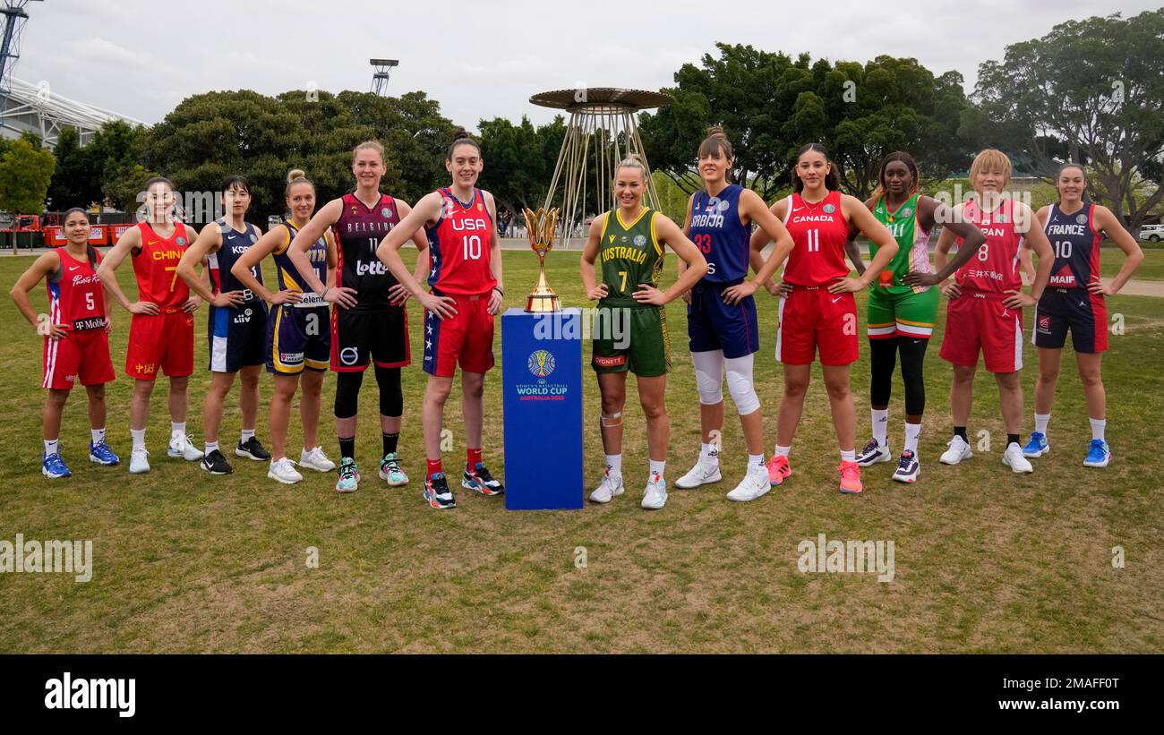 Team captains pose for a group photo ahead of the women's Basketball ...