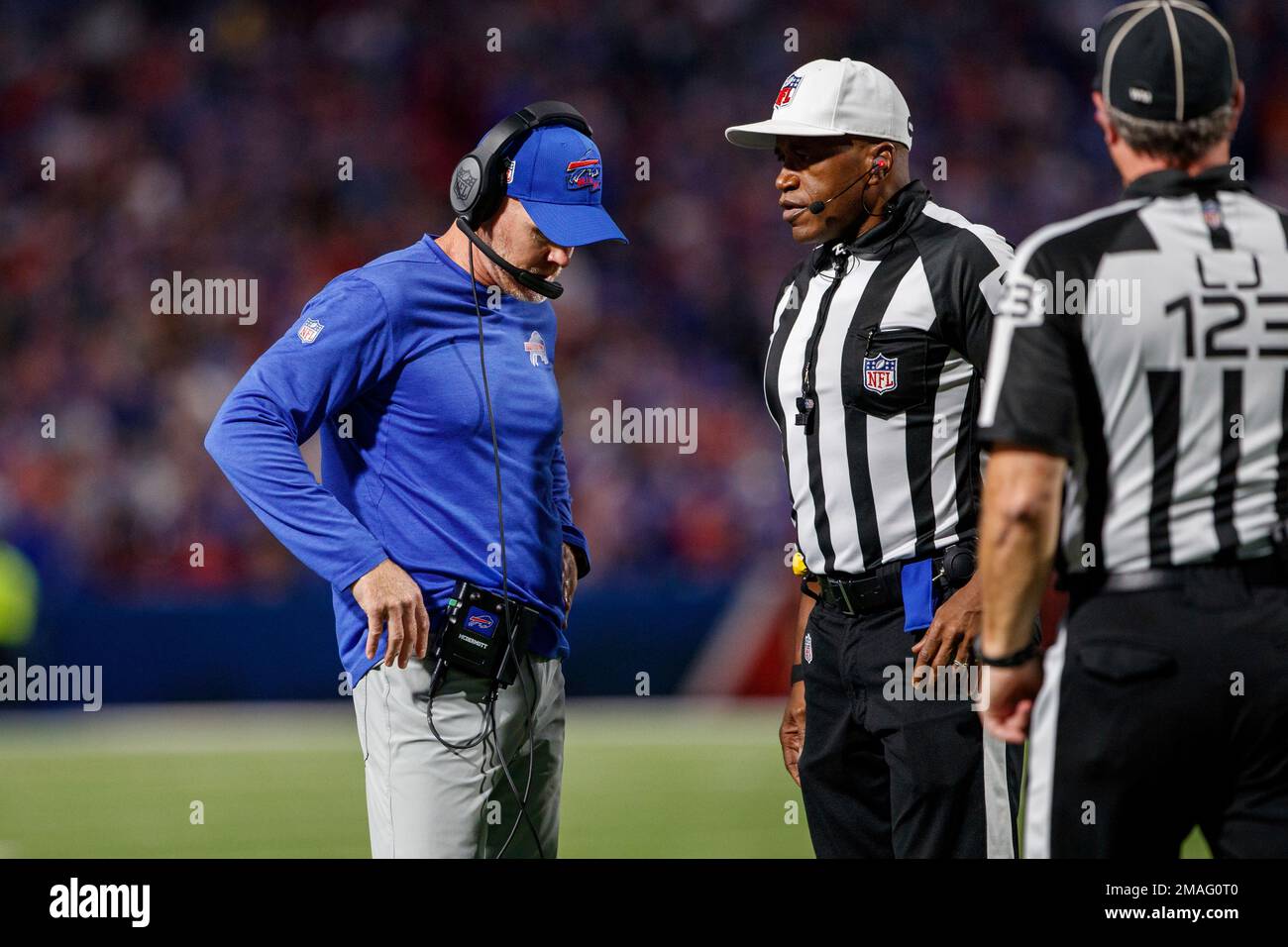 Referee Shawn Smith (14) talks to Buffalo Bills head coach Sean ...