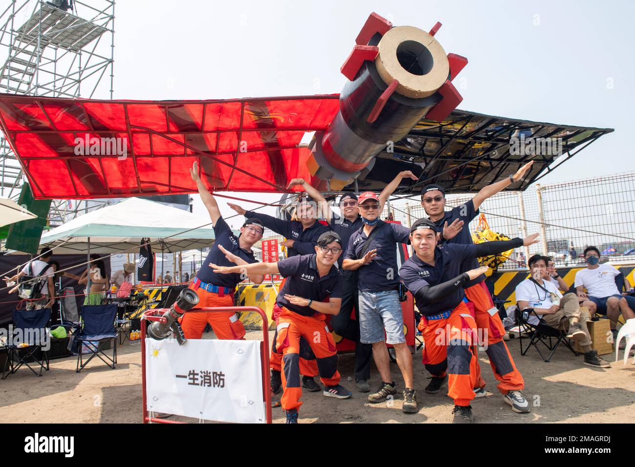 Team members from "Firefighting Life" poses with their man made flying ...