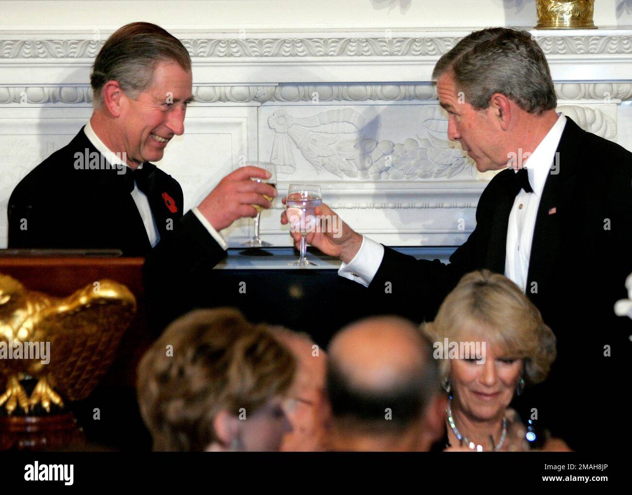 FILE - Britain's Prince Charles makes a toast with President George W ...