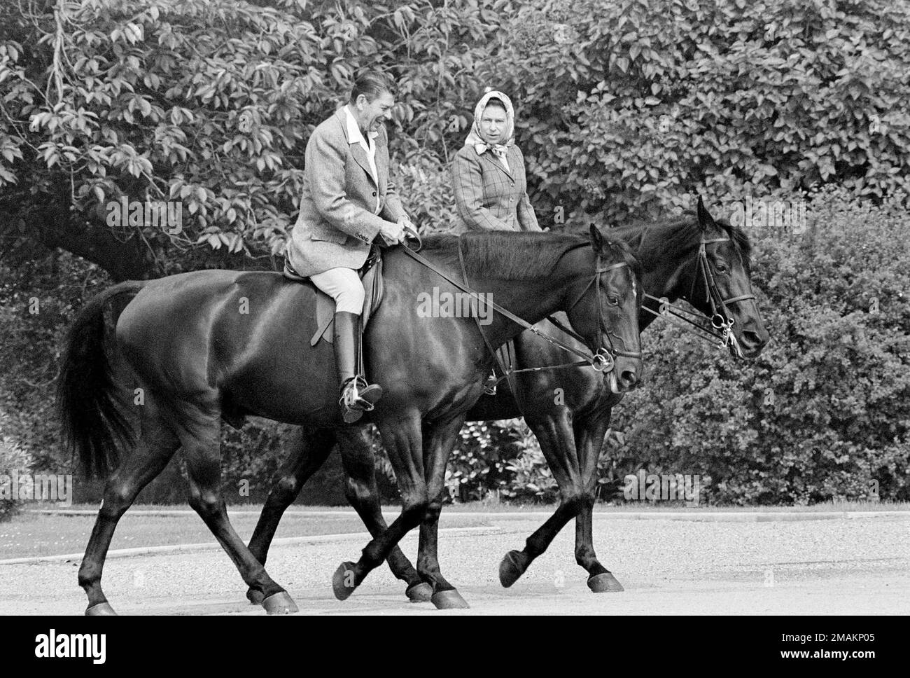 FILE - U.S. President Ronald Reagan, on Centennial, and Queen Elizabeth ...