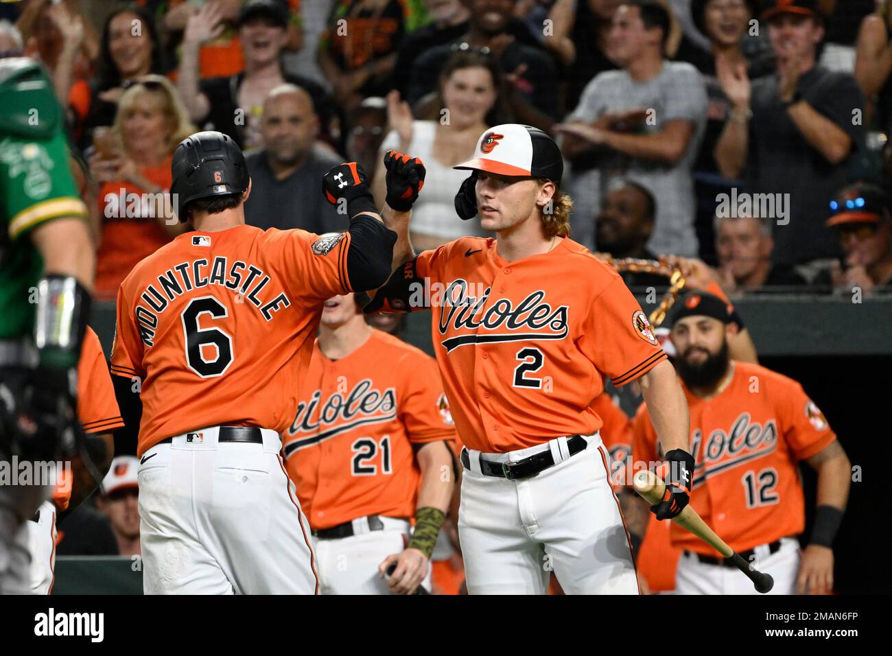 Baltimore Orioles' Ryan Mountcastle (6) is greeted by Gunnar Henderson ...