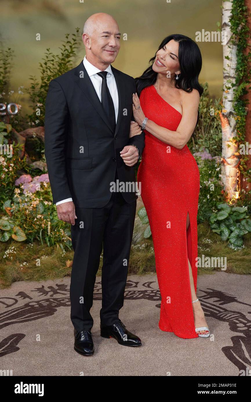 Jeff Bezos, left, and Lauren Sanchez pose for photographers upon their ...