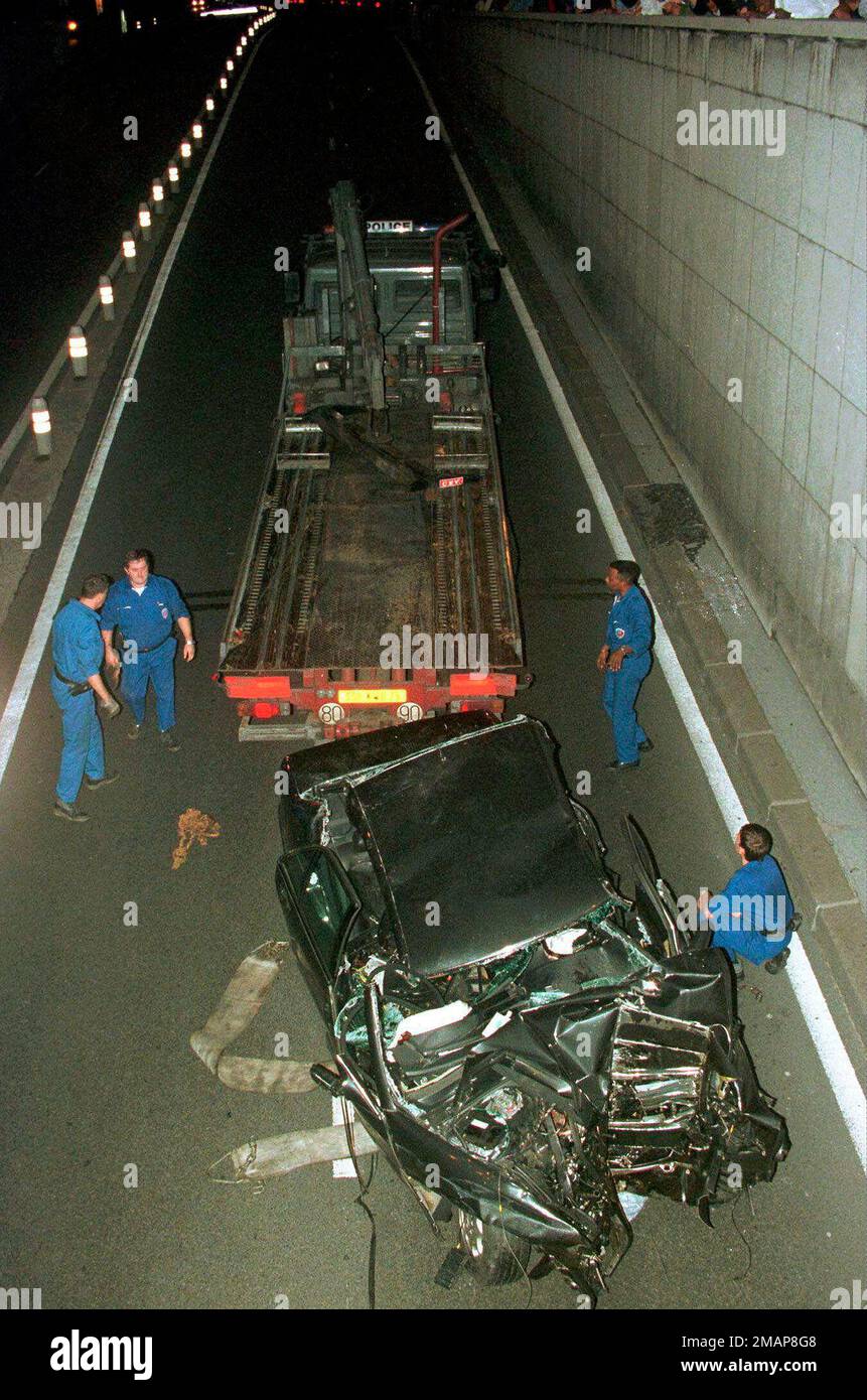 FILE - Police services take away the car in which Diana, Princess of ...