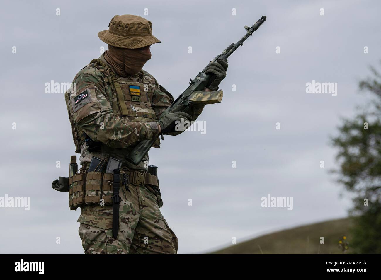 A volunteer soldier attends a training outside Kyiv, Ukraine, Saturday ...