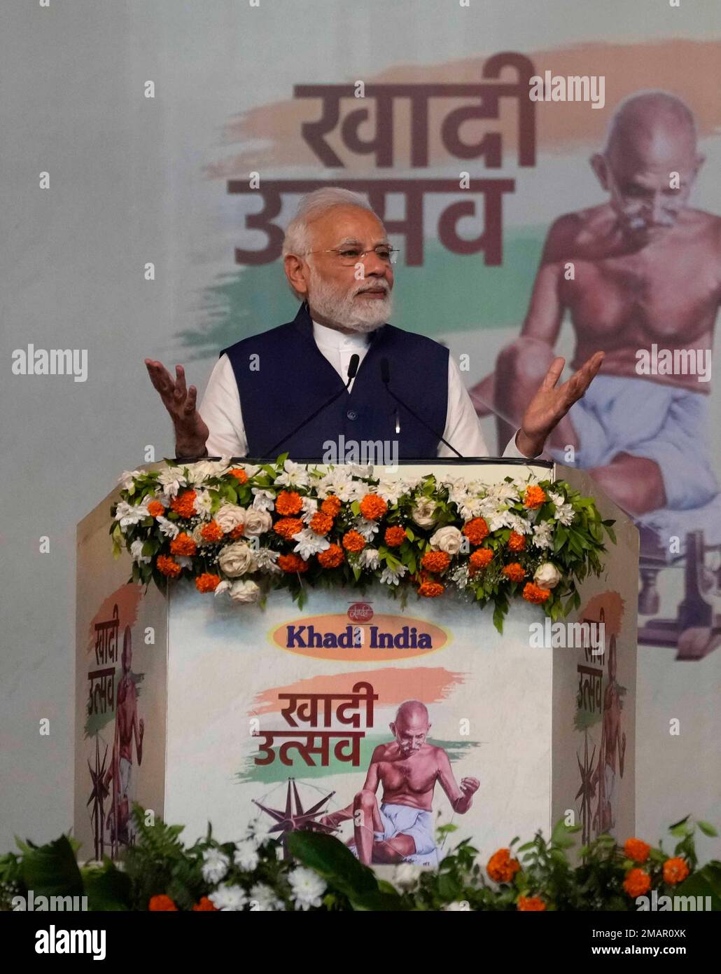 Indian Prime Minister Narendra Modi speaks during Khadi Utsav at Sabarmati riverfront in ...