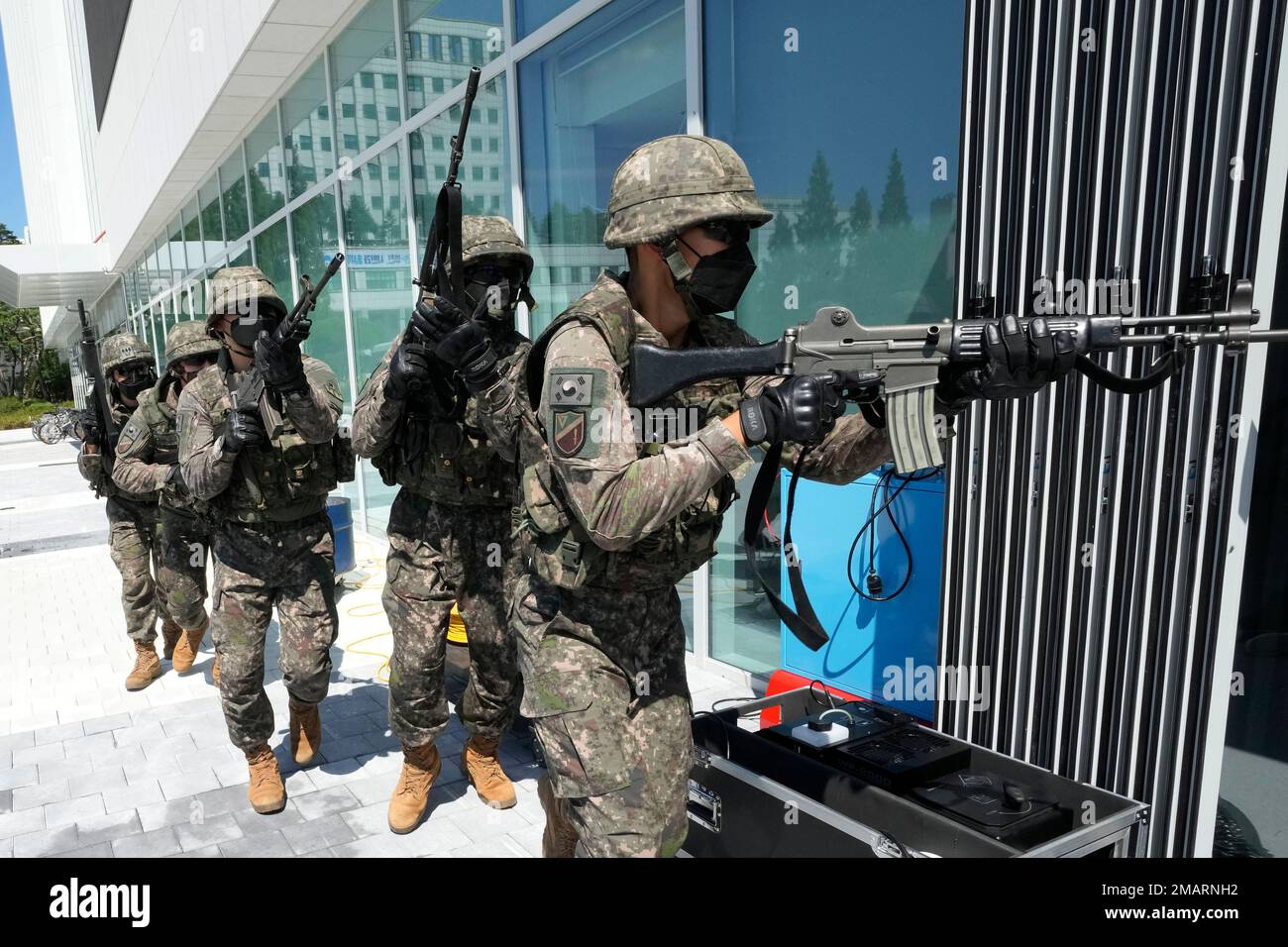 South Korean army soldiers conduct an anti-terror drill as part of the ...